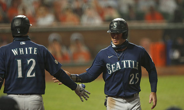 Breakout season for Mariners' Dylan Moore cut short due to concussion ...