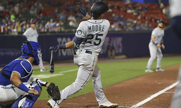 Dylan Moore's late blast lifts Mariners to 9-7 win over Blue Jays in extras