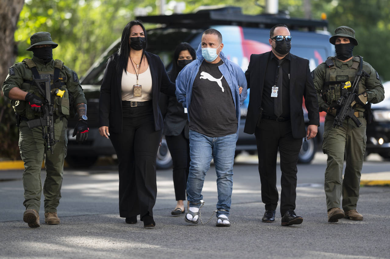 5 accused a decade after renowned Puerto Rican boxer killed