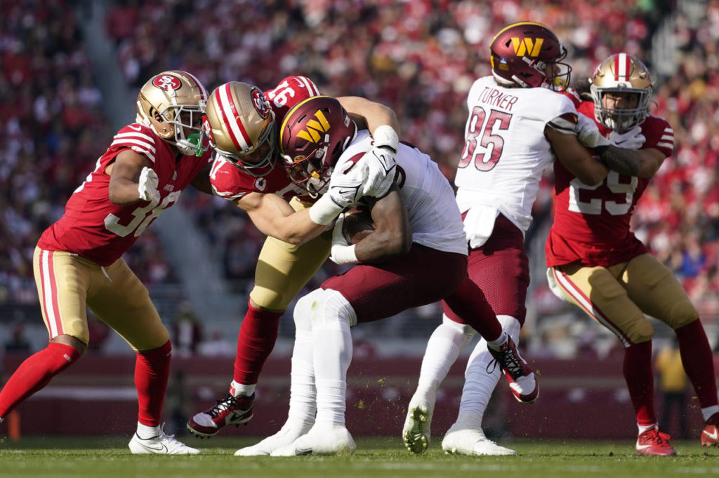 Purdy leads 49ers past Commanders 37-20 for 8th straight win