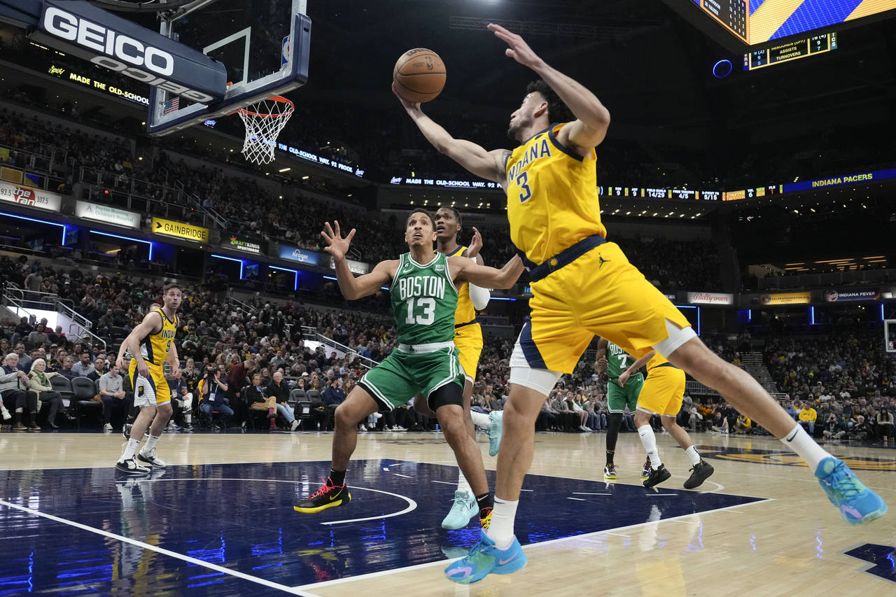 Tatum has 31, breaks tie late in OT, Celtics outlast Pacers